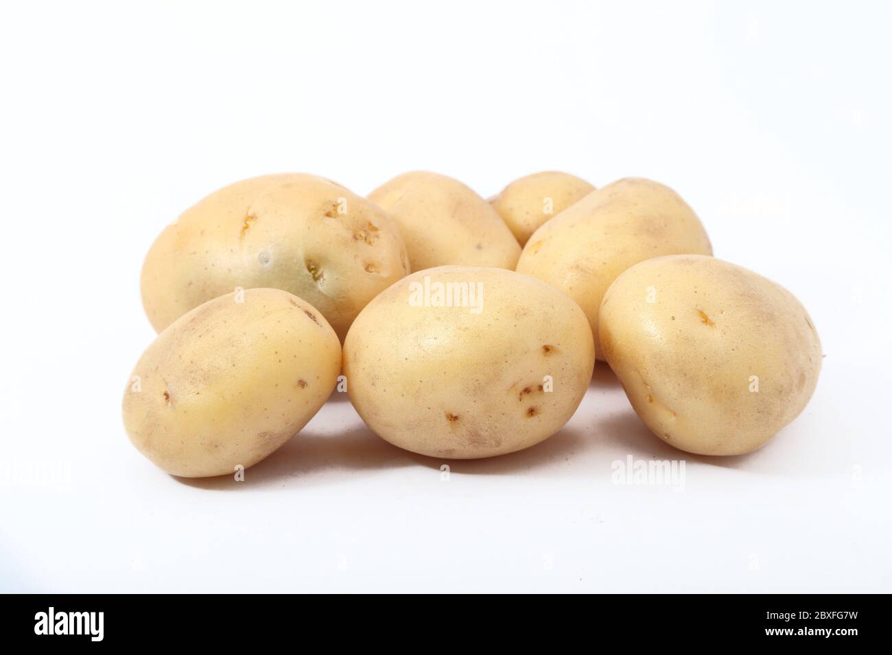 Potatoes isolated on white background Stock Photo - Alamy