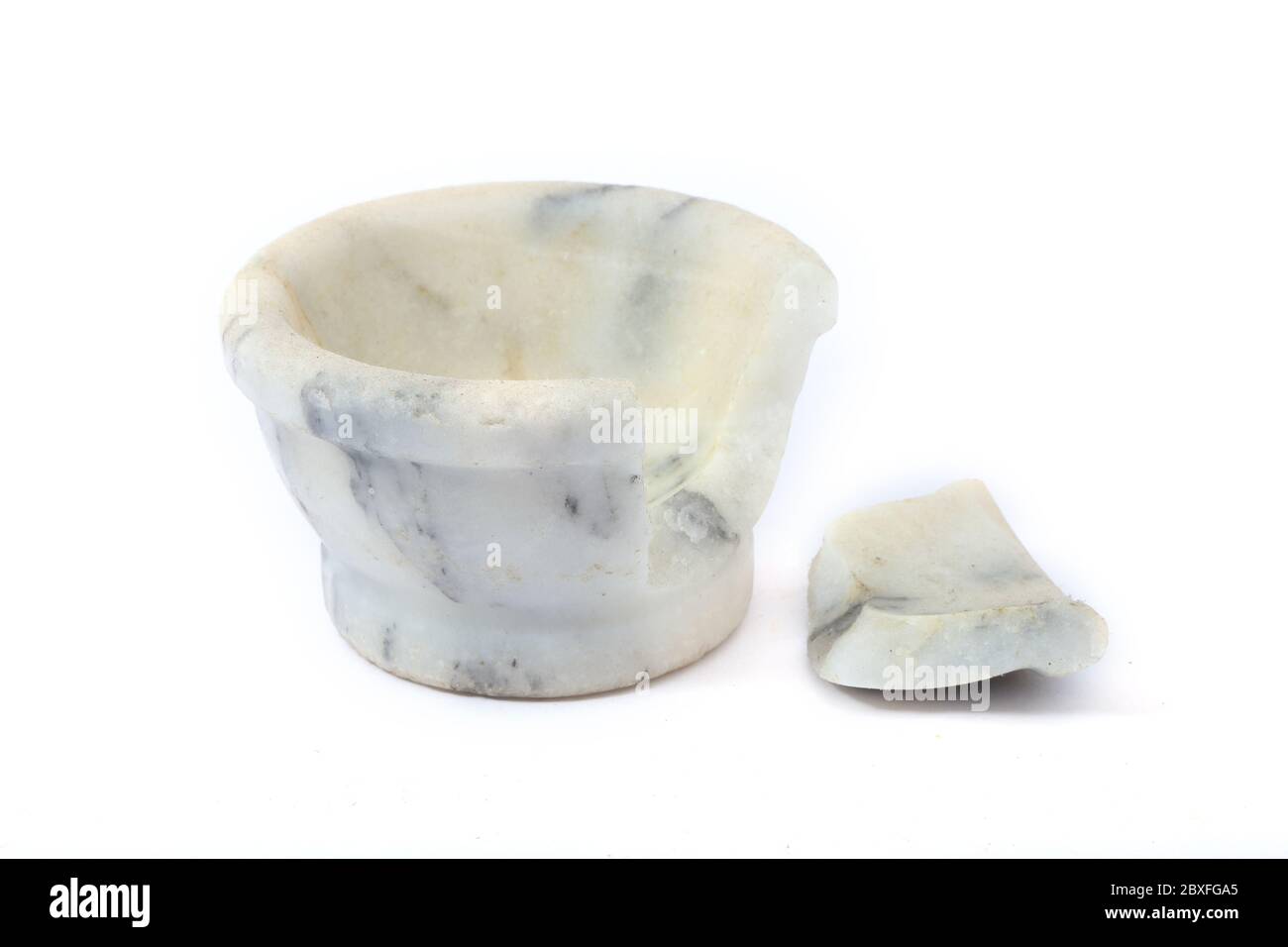 Broken Marble mortar and pestle Stock Photo - Alamy