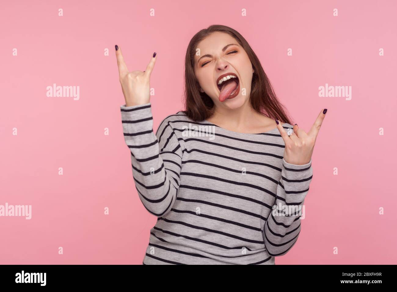 Devil hand gesture hi-res stock photography and images - Alamy