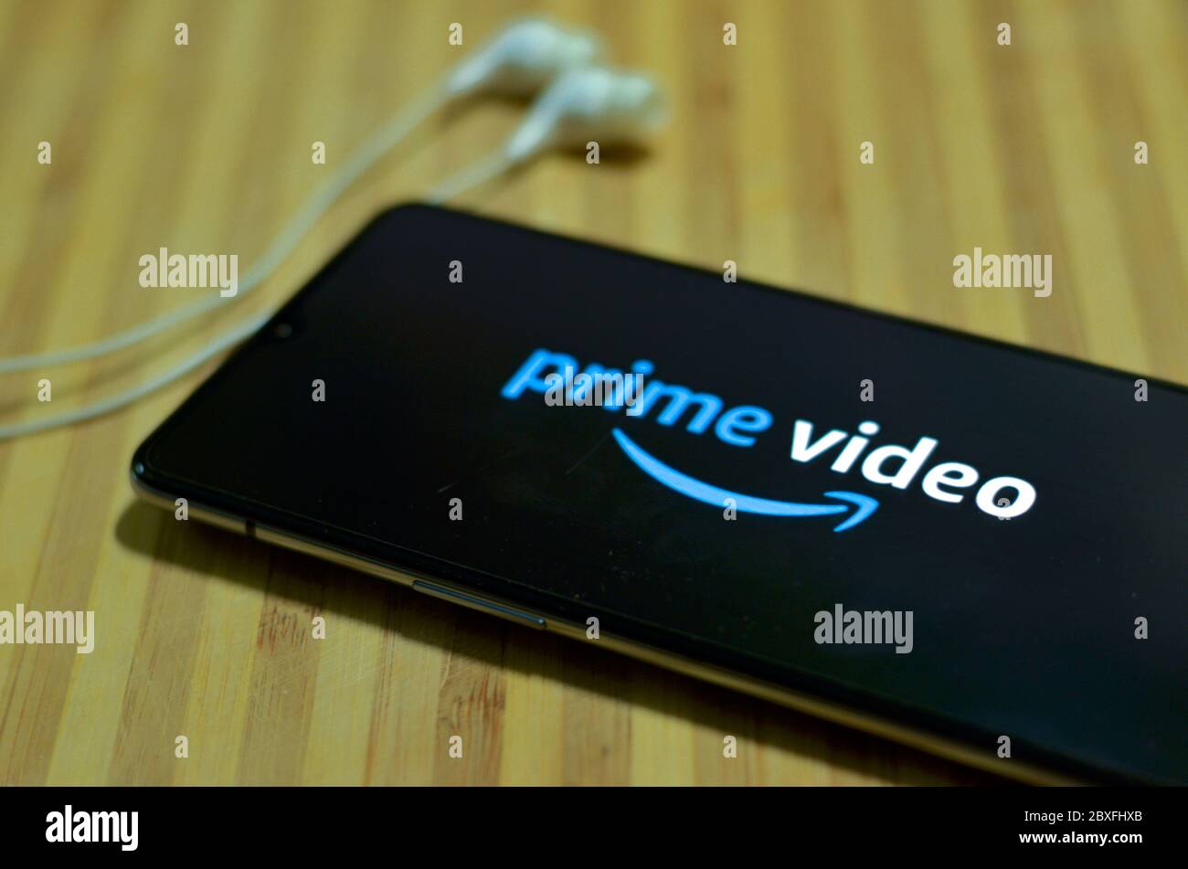 New York, USA, 2020. Flat layout on wooden board with Prime video app ...