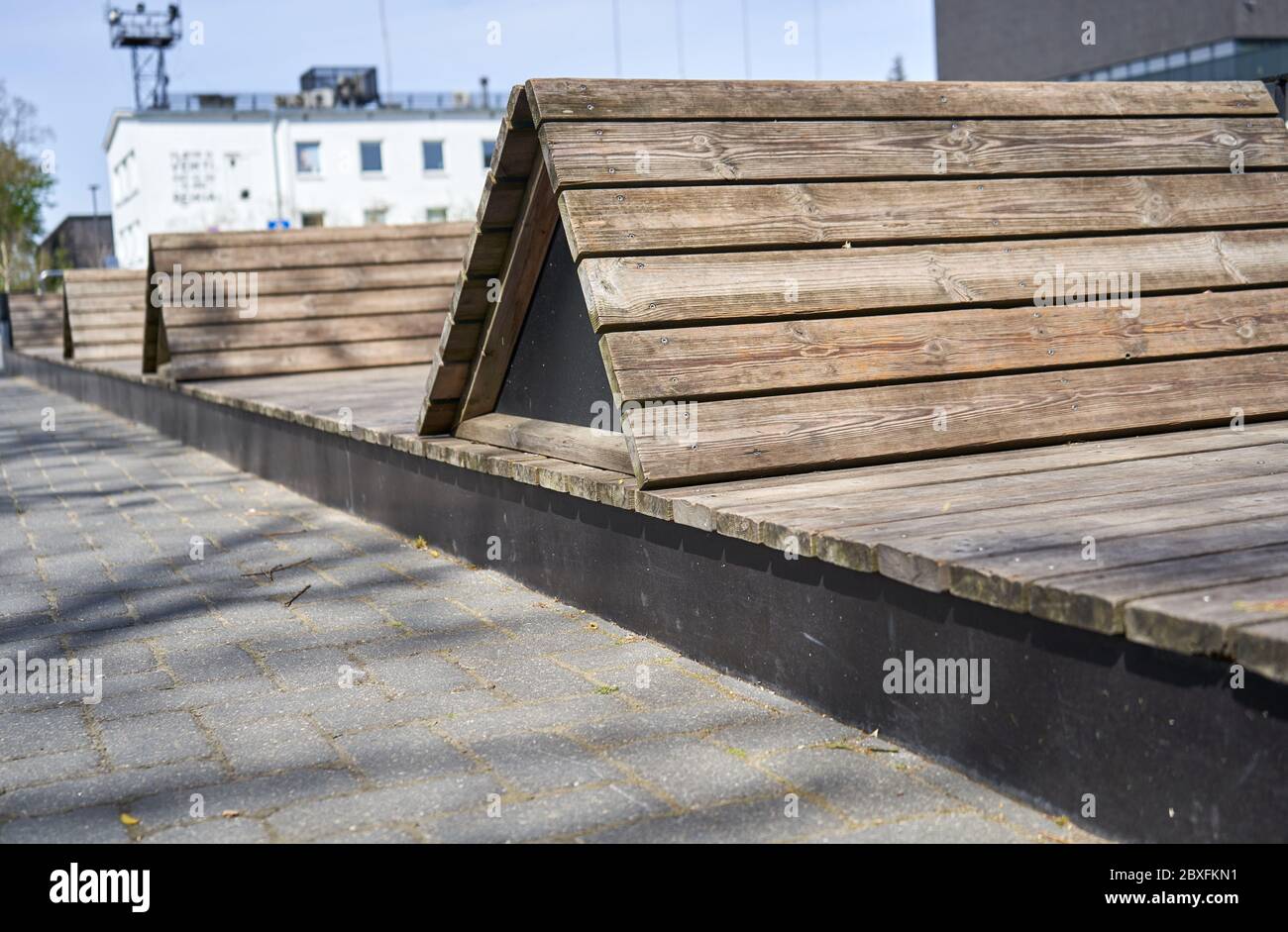 Wooden benches in the city Stock Photo - Alamy