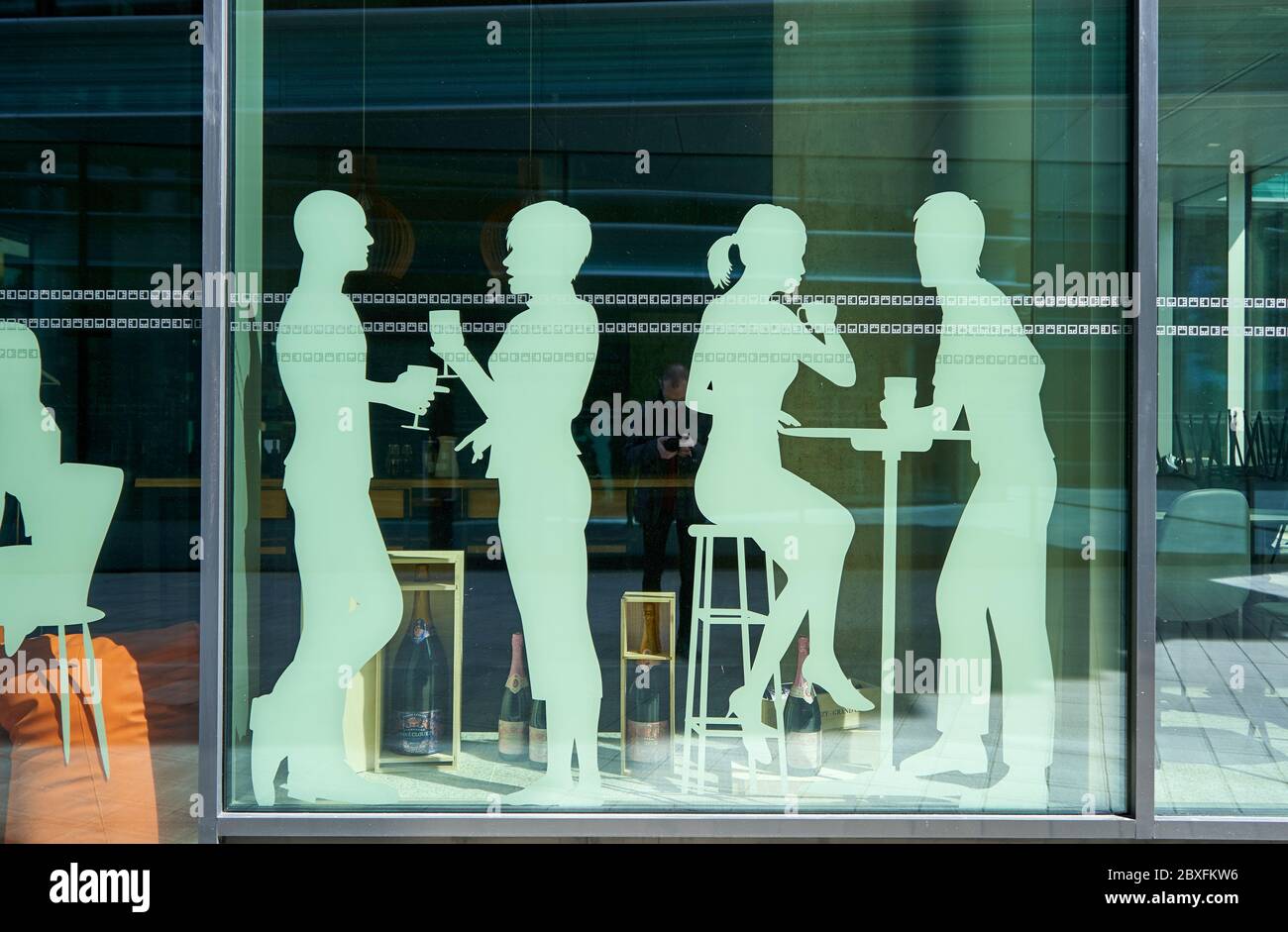 People silhouettes on the shop window Stock Photo - Alamy