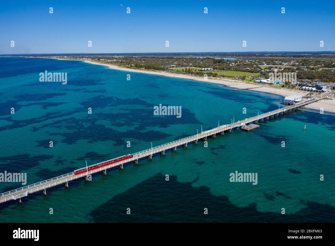Aerial view of the train on Busselton pier, the worlds longest wooden ...