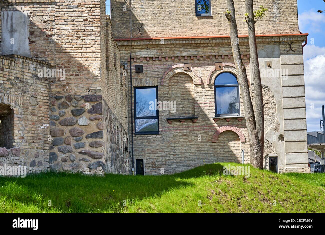 Old stone and brick building reconstruction Stock Photo - Alamy