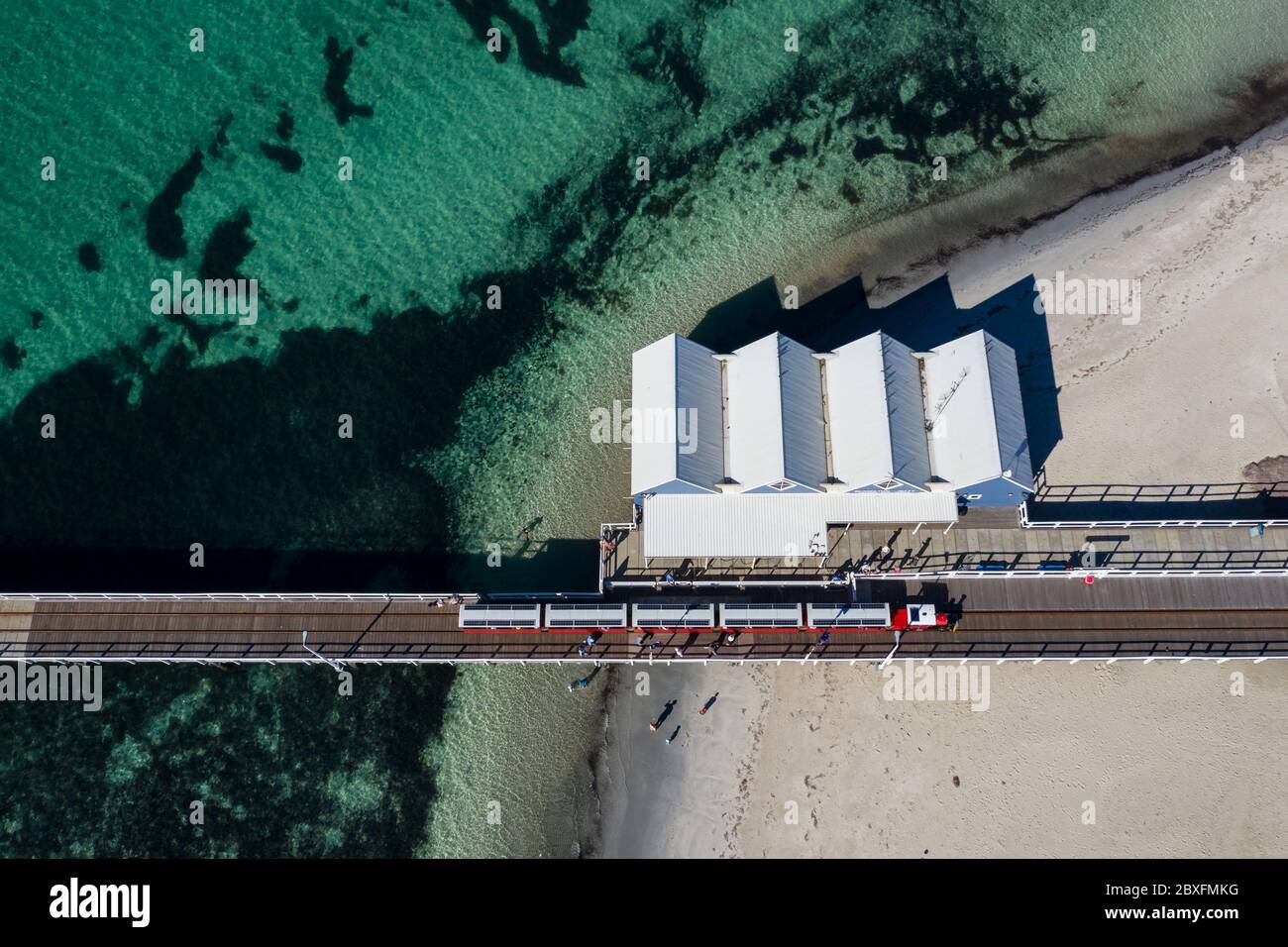 Aerial view of the train on Busselton pier, the worlds longest wooden ...