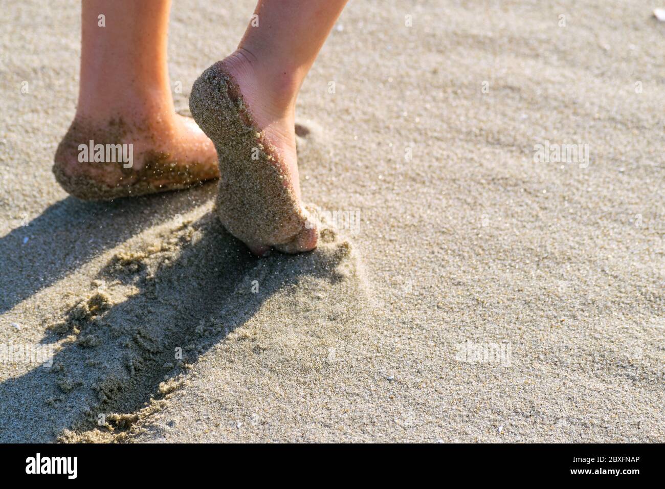Barefoot boy child walking hi-res stock photography and images - Alamy