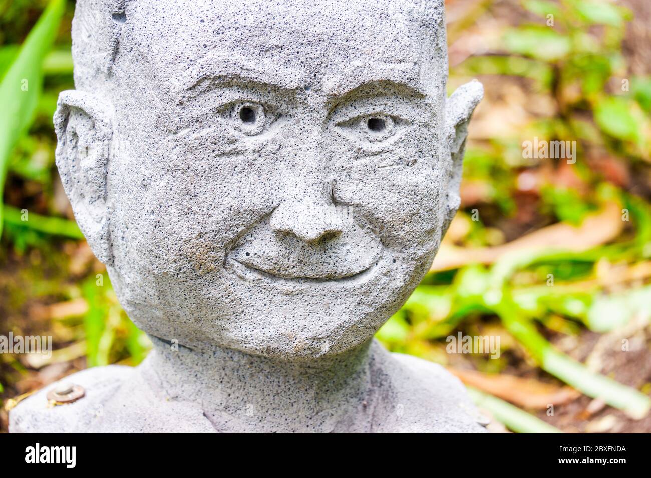 Details of the cute stone doll face that adorned the garden. Good ...