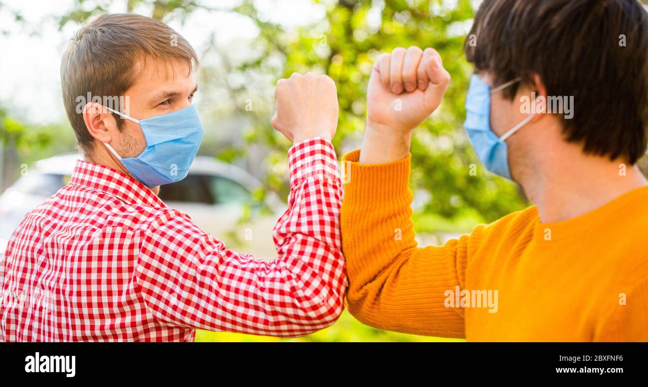 Elbows greeting hi-res stock photography and images - Alamy