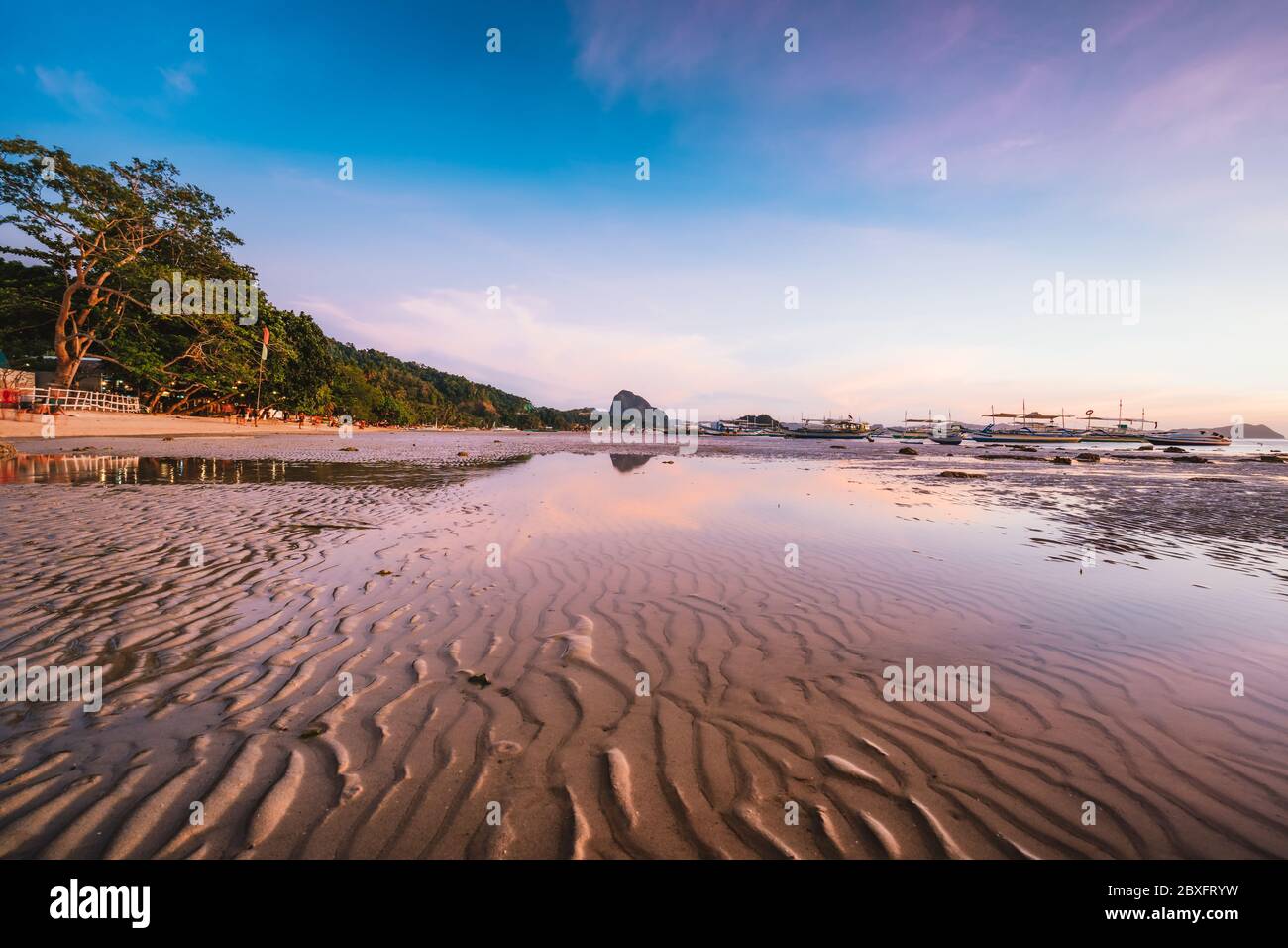 Long corong beach at sunset. El Nido, Philippines Stock Photo - Alamy