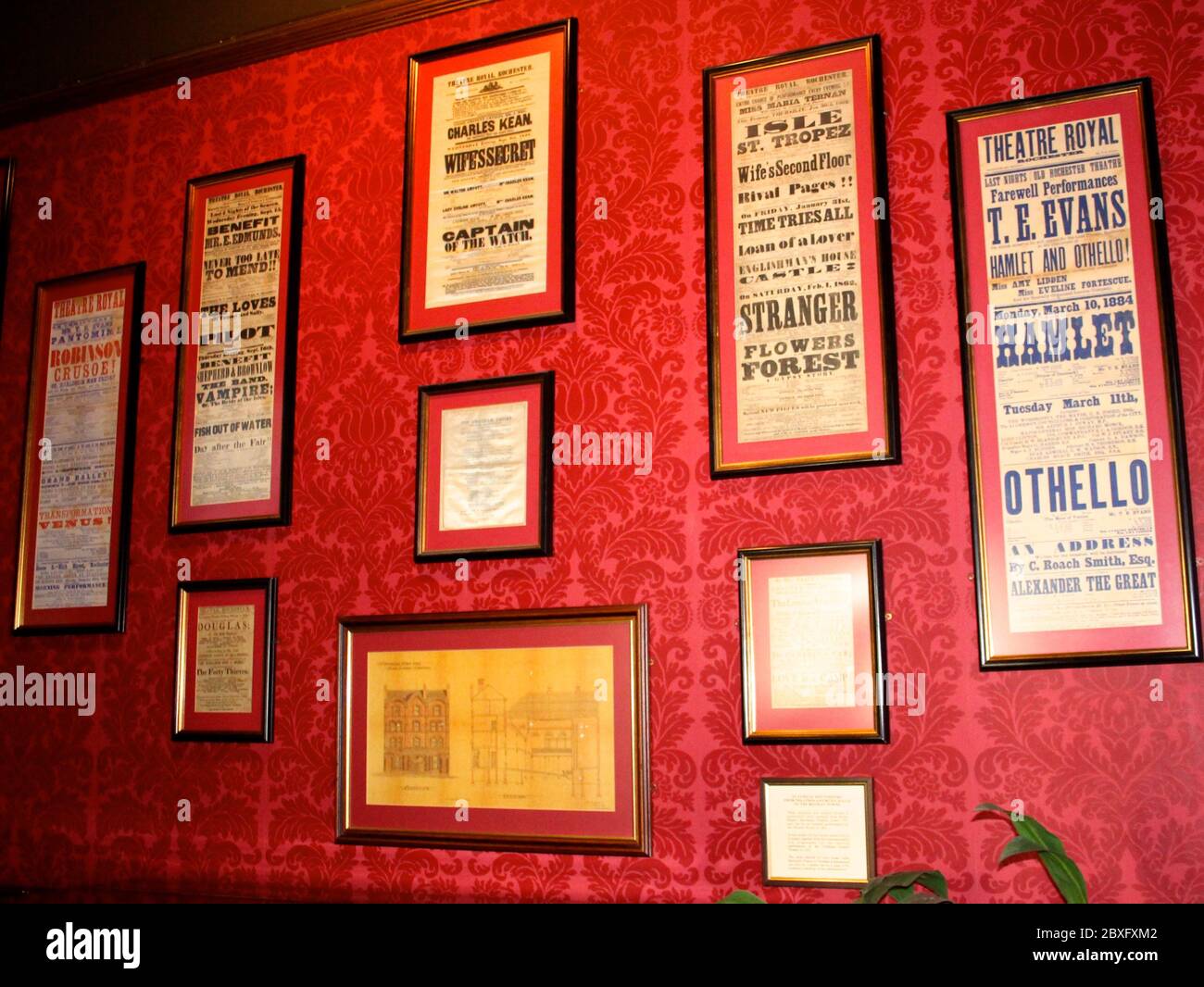 Old theatre posters on a wall displayed in Rochester Guild Hall Kent ...