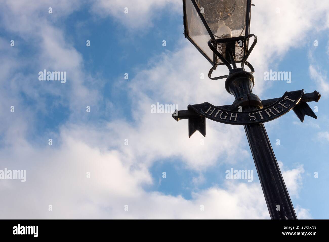 High street sign on lamp post Stock Photo - Alamy