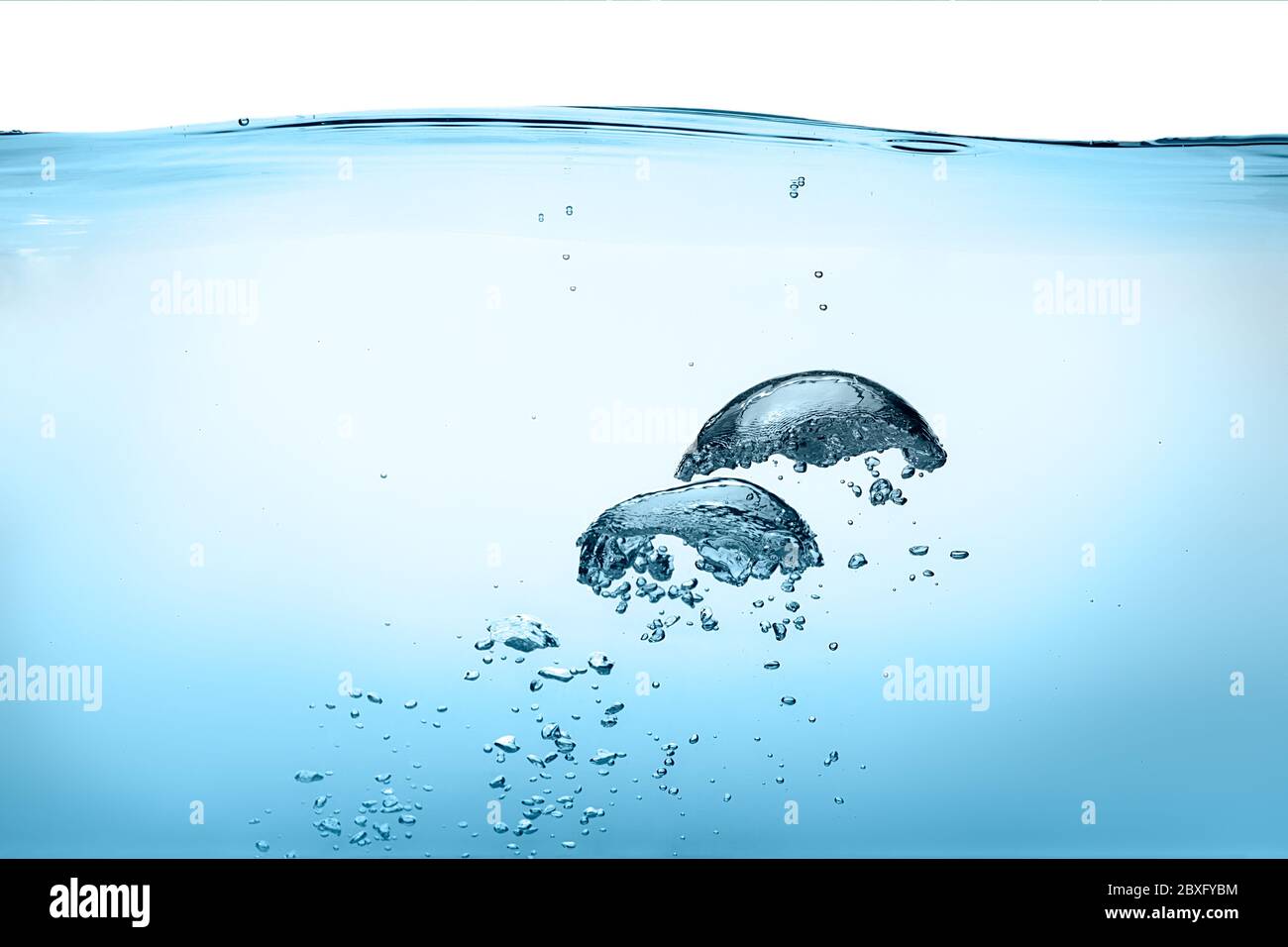 Oxygen bubbles in blue water Stock Photo - Alamy