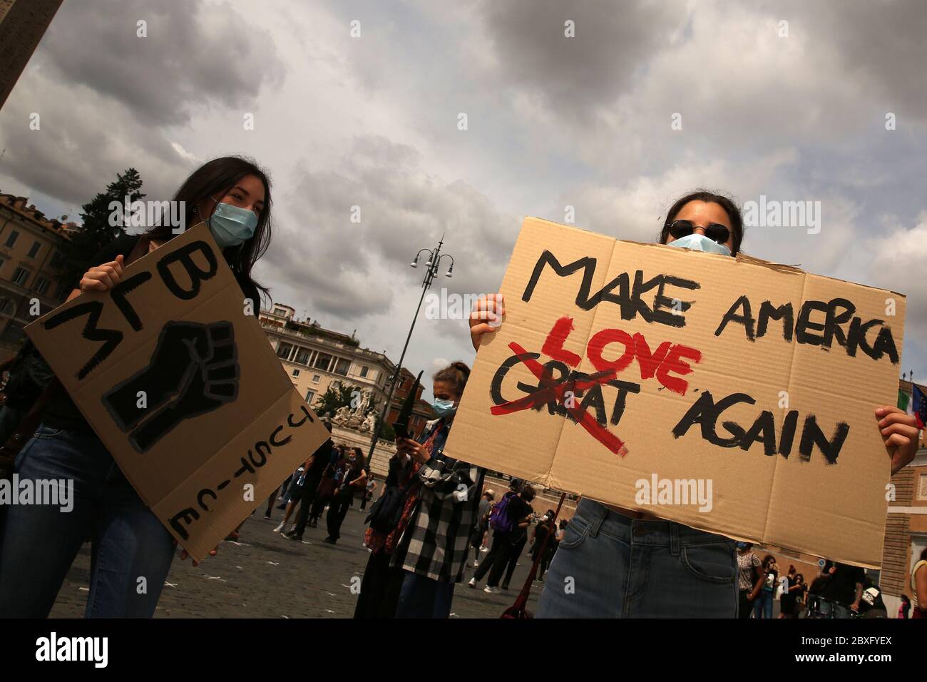 Rome, Italy. 07th June, 2020. Two girls holding signs during a Black ...