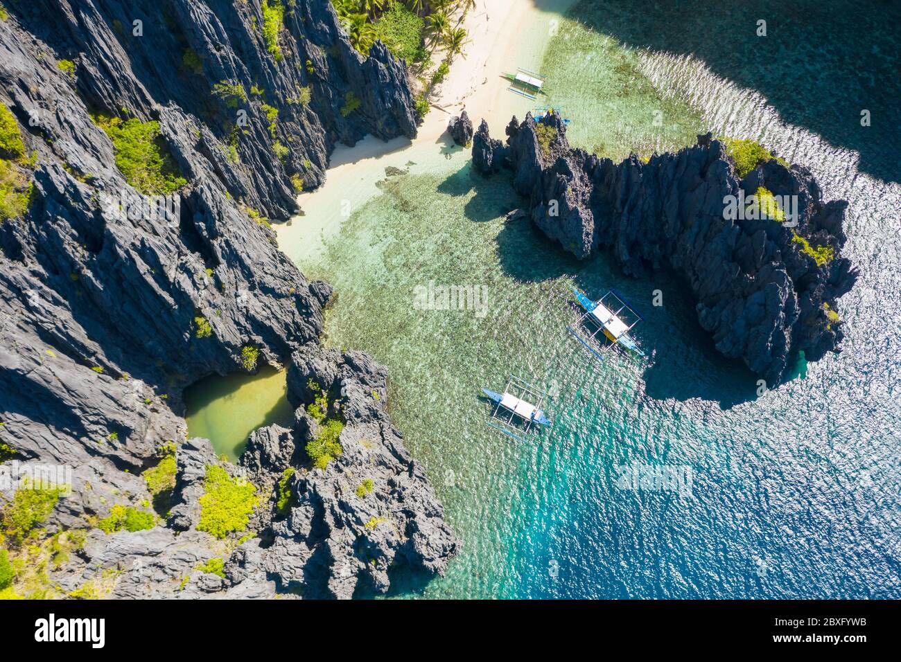 El Nido, Palawan, Philippines, aerial view of boats and cliffs rocky ...