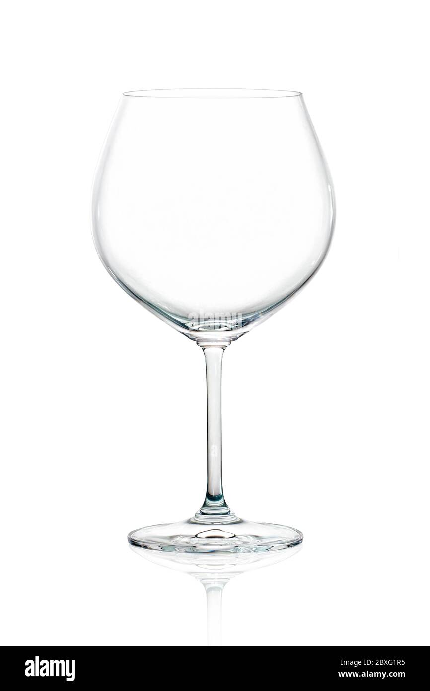 Closeup of empty balloon glass for red wine isolated on white ...