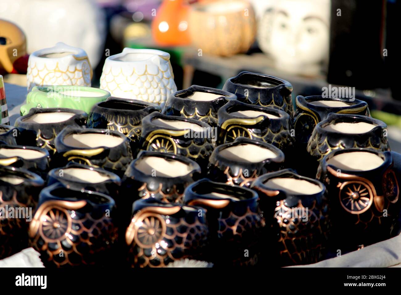 colorful pottery with traditional artwork, water pot Sculpture Made ...