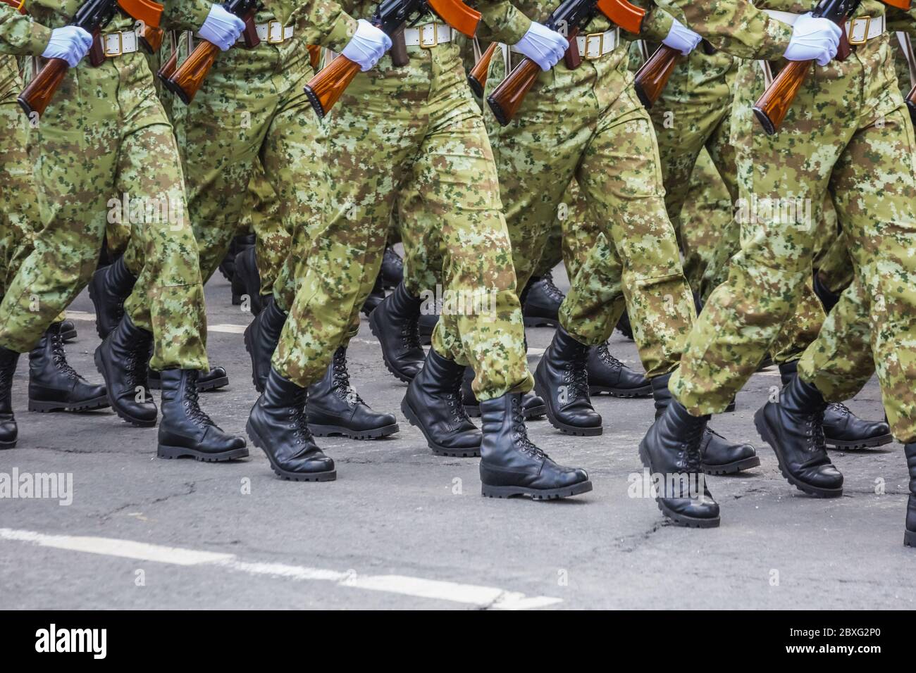 Military men marching at the celebration of the 75th anniversary of the ...