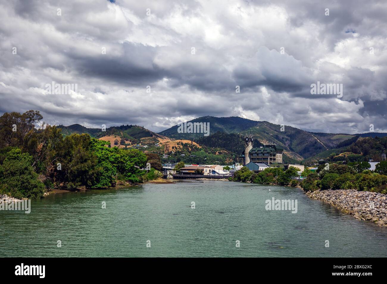 View from a bridge on city centre with a historic heritage building at ...