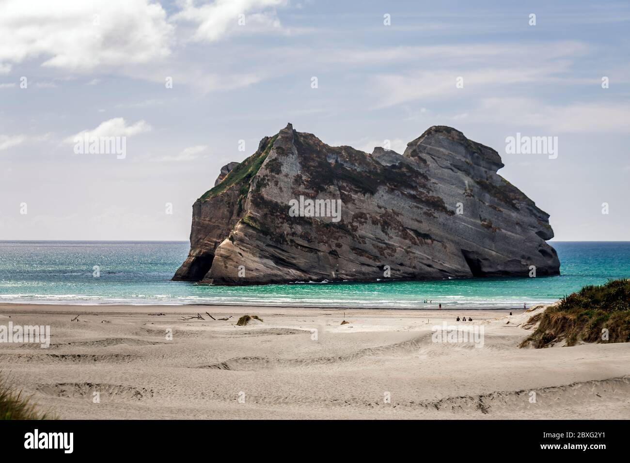 Famous rock formations on the Wharariki beach in National Park. Nelson ...