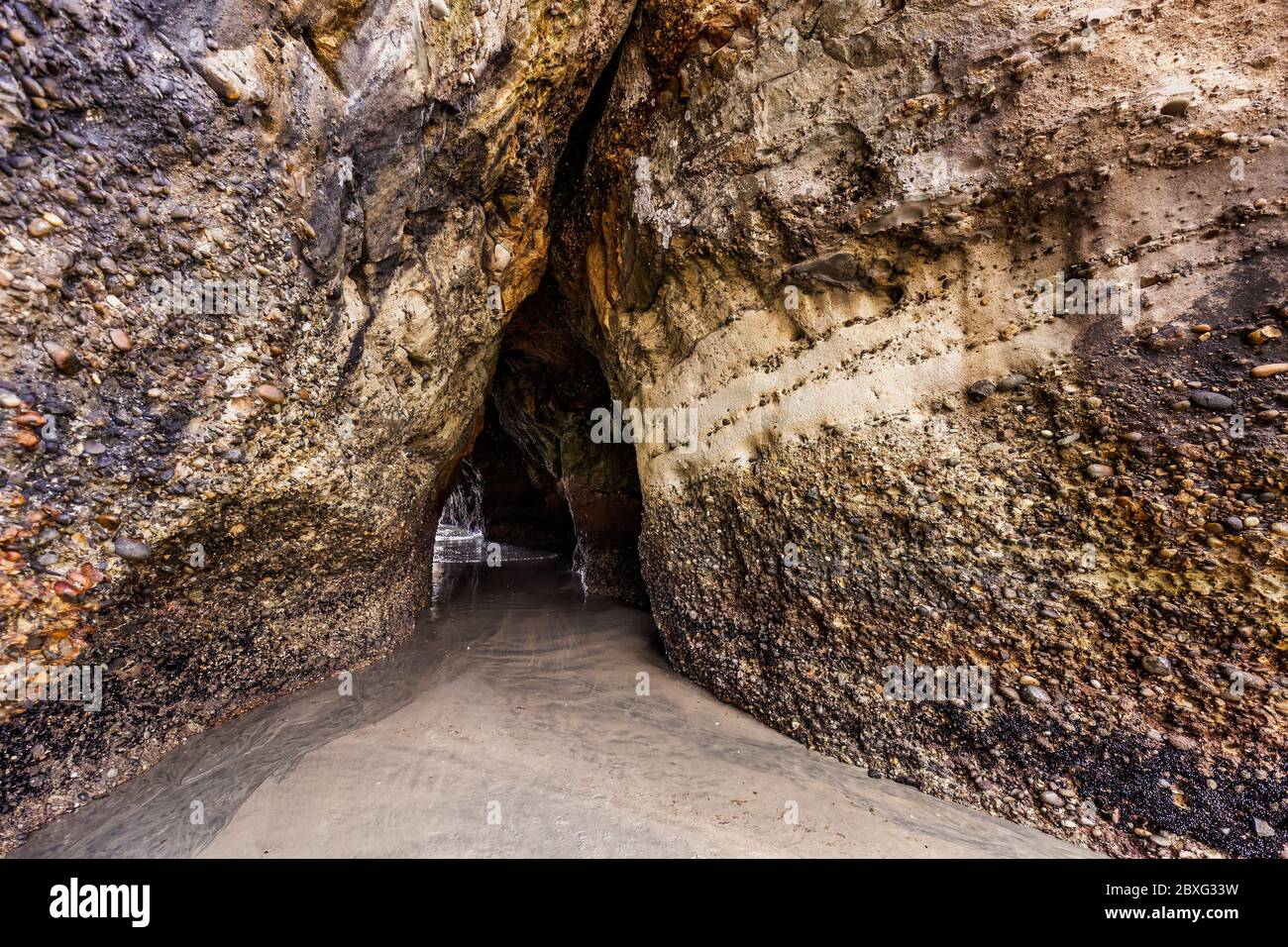 Famous rock formations on the Wharariki beach in National Park. Nelson ...