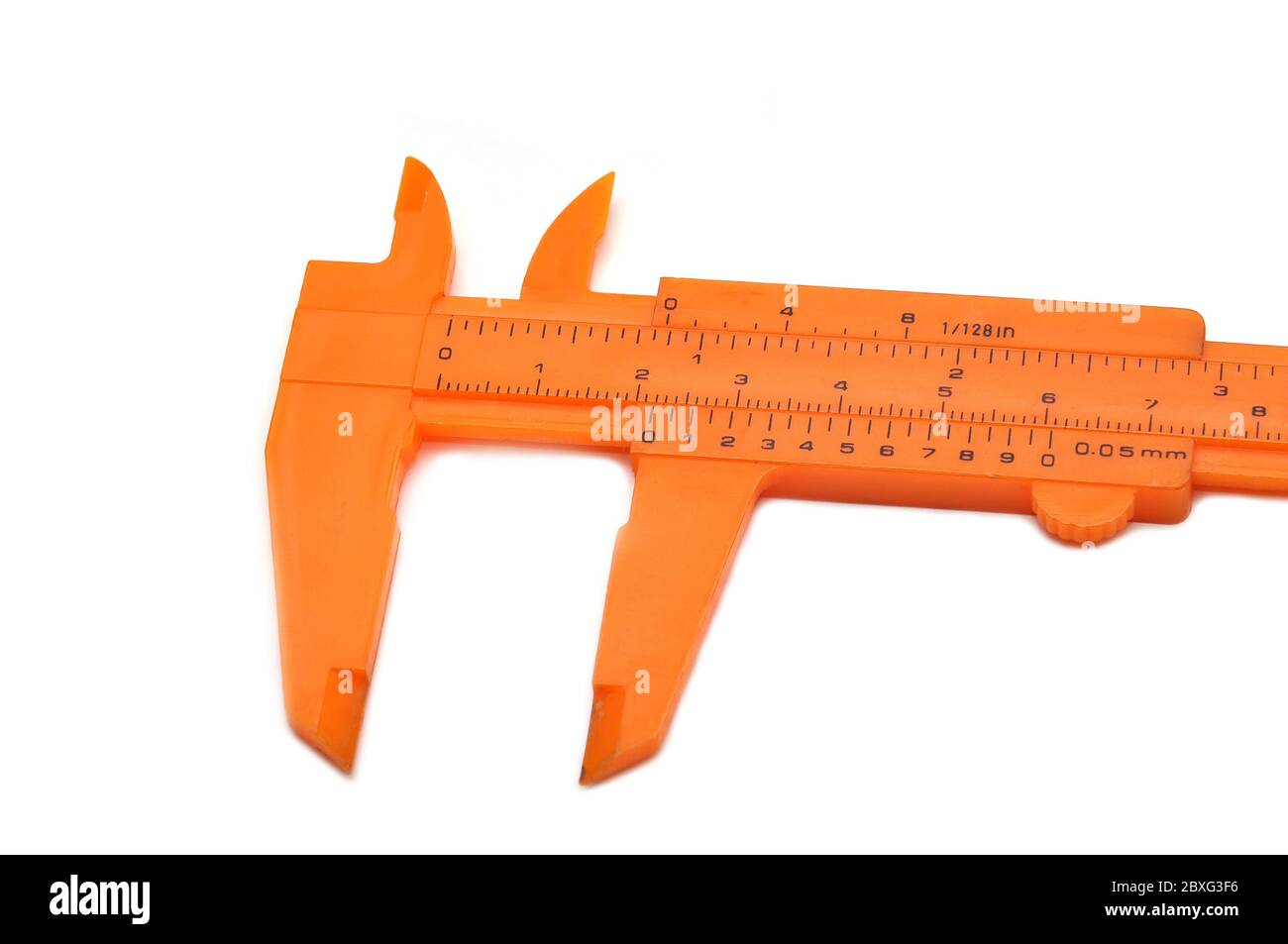 Orange vernier caliper isolated on white background Stock Photo - Alamy