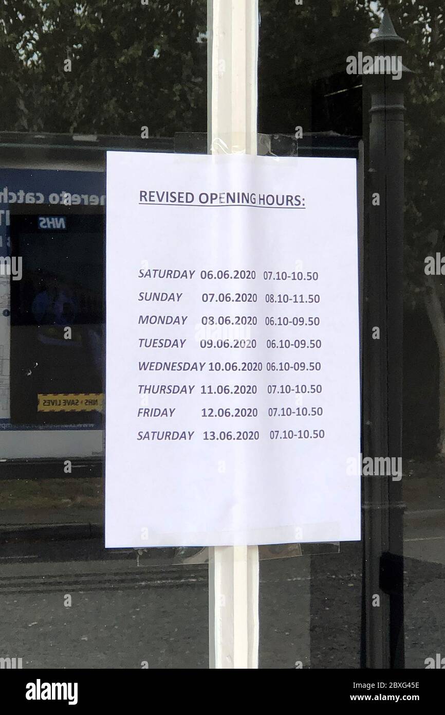 A general view of a 'revised opening hours' poster at Braintree railway ...