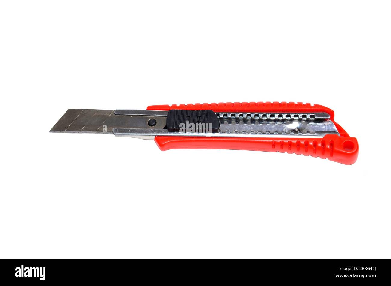 Red knife cutter isolated on white background Stock Photo - Alamy