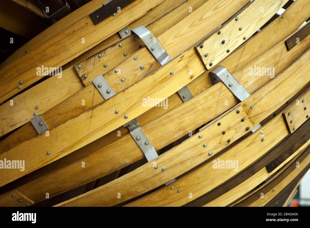 Wooden striped curving background, abstract design. Bend timber details ...