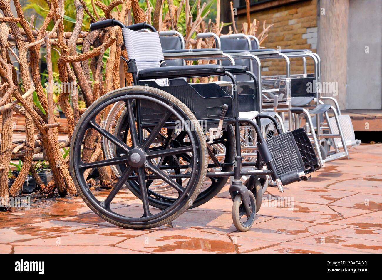 A wheelchair is a chair with wheels used for the patient or the cripple ...