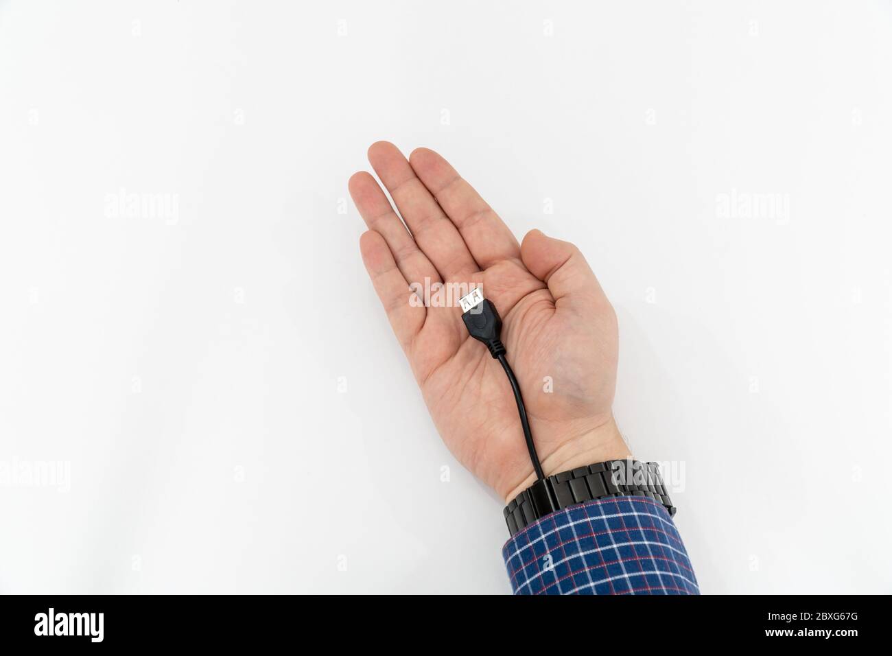 Augmented human hand with the cable sticking out for transferring data ...