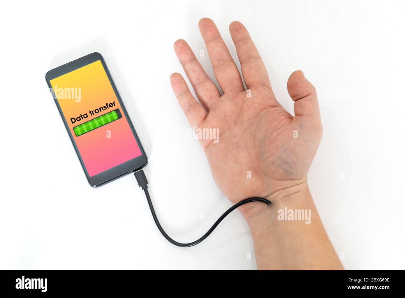 Augmented human hand connected to a smartphone via usb cable and ...