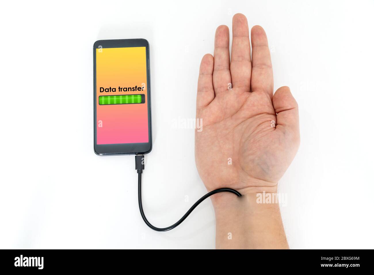 Augmented human hand connected to a smartphone via usb cable and ...