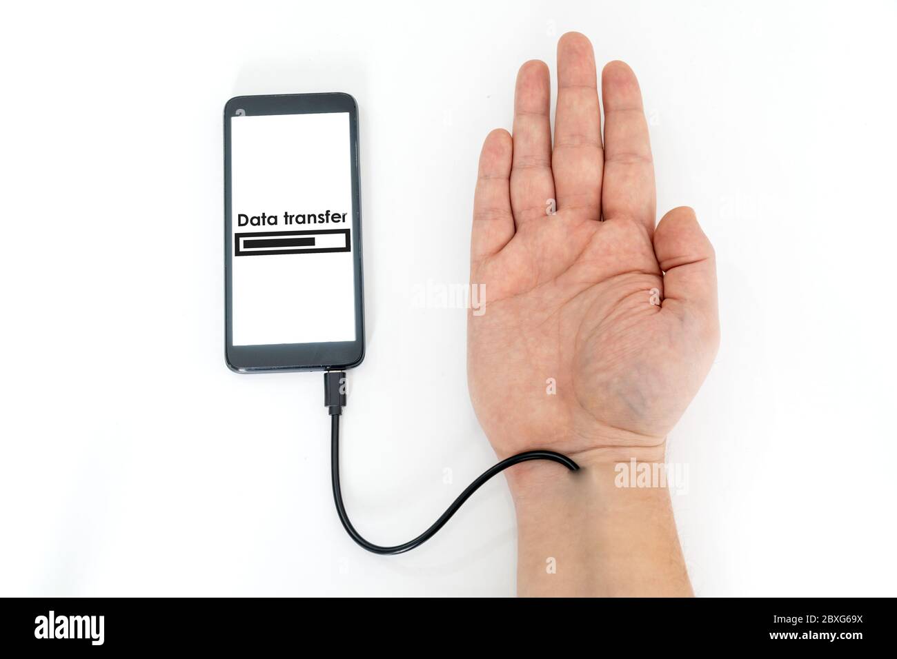 Augmented human hand connected to a smartphone via usb cable and ...