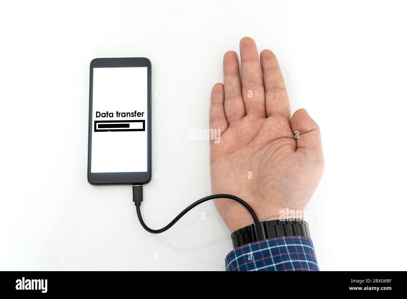 Augmented human hand connected to a smartphone via usb cable and ...