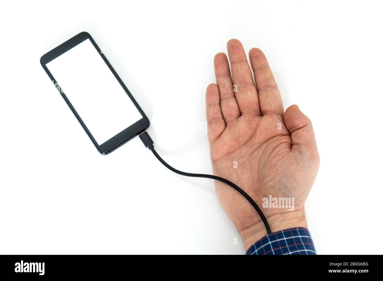 Augmented human hand connected to a smartphone via usb cable and ...