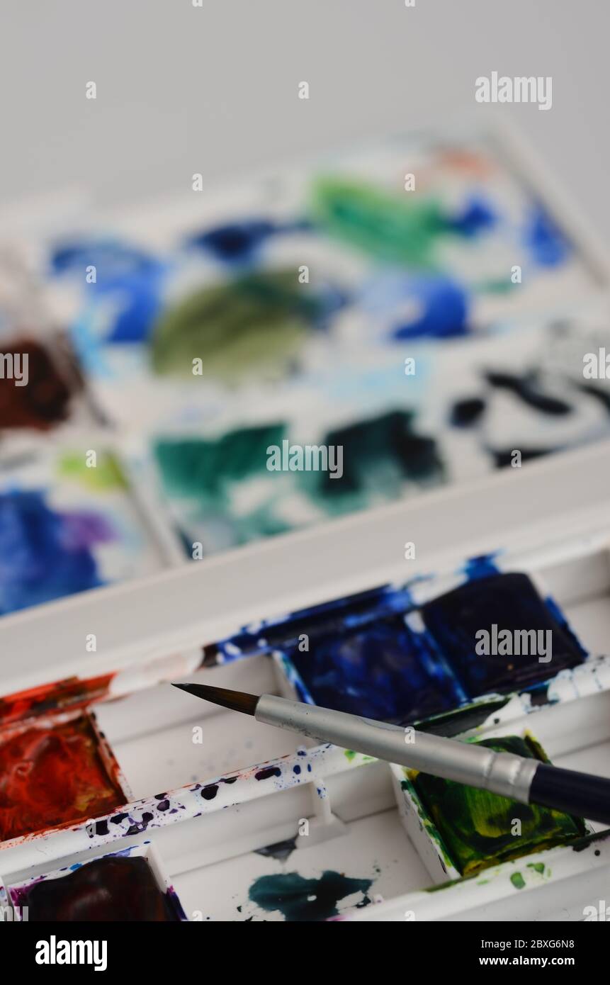 Used watercolor paint palette for painting hobby illustration Stock ...