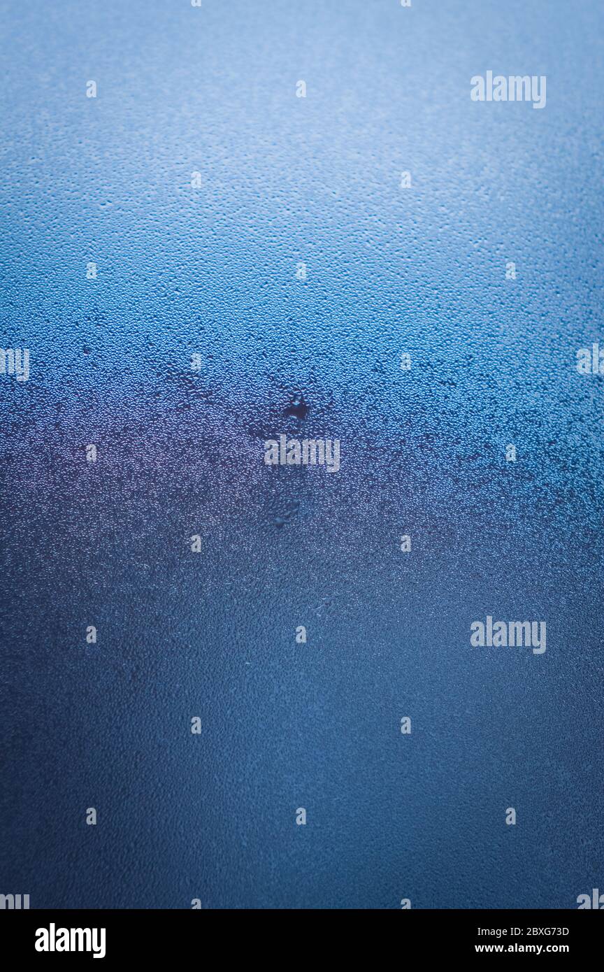 blue steam condensation on a glass - freshness abstract background ...