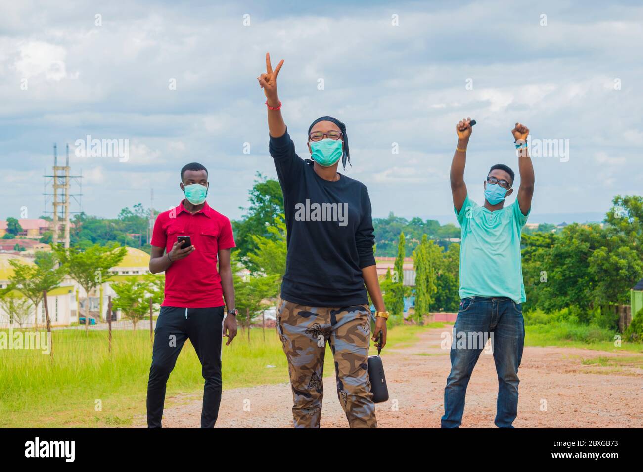 group of africans wearing face mask to prevent, preventing, prevented ...