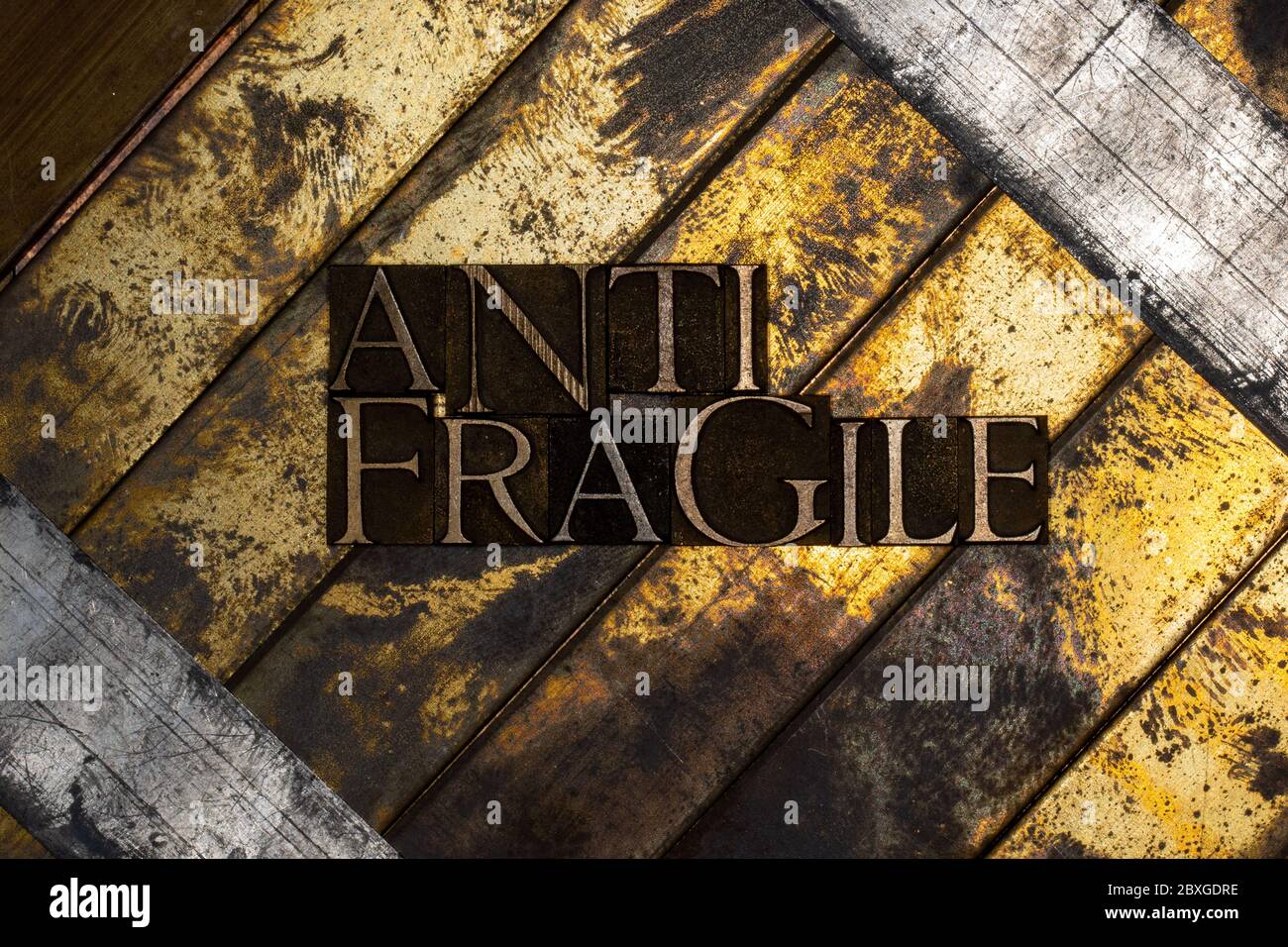Photo of real authentic typeset letters forming Anti Fragile text on ...