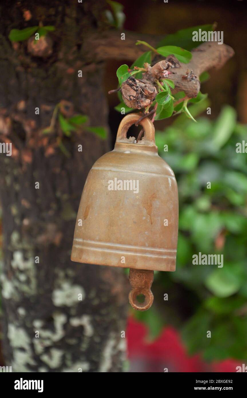 small buddhist bell hanging to worship Stock Photo - Alamy
