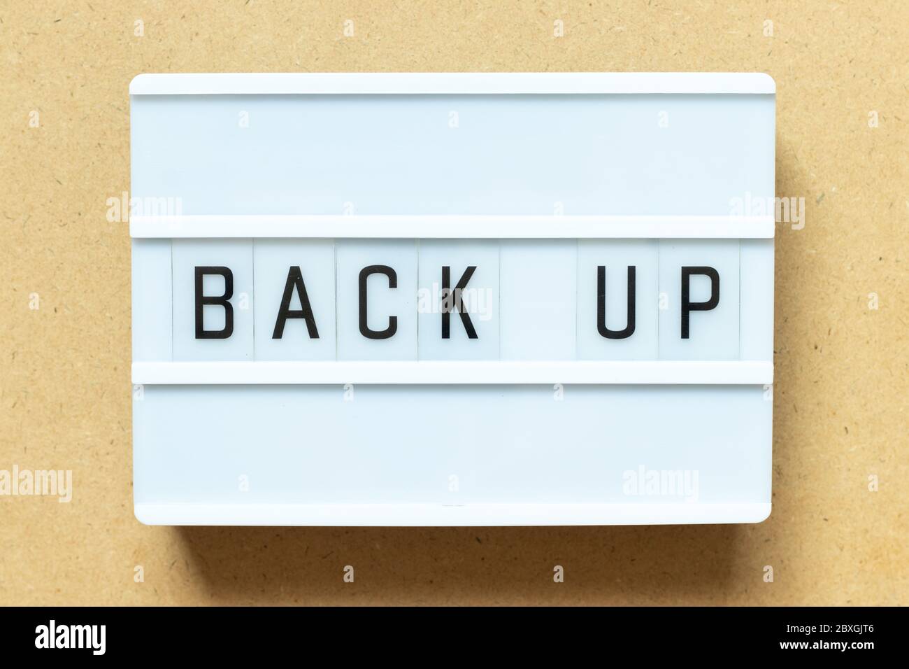 Lightbox with word back up on wood background Stock Photo - Alamy