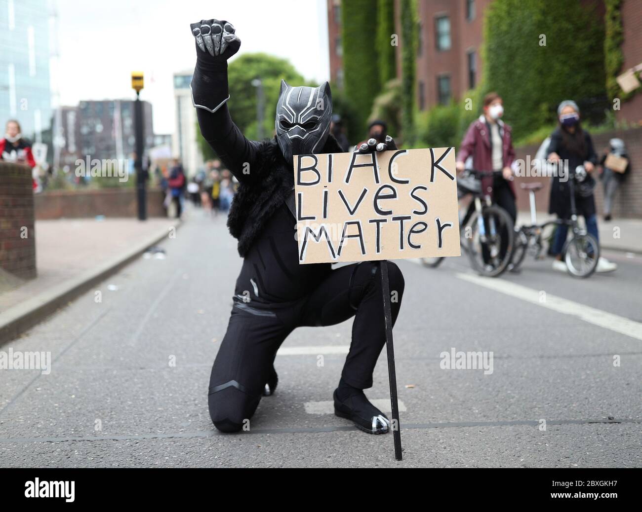 Dressed as the superhero black panther hi-res stock photography and ...