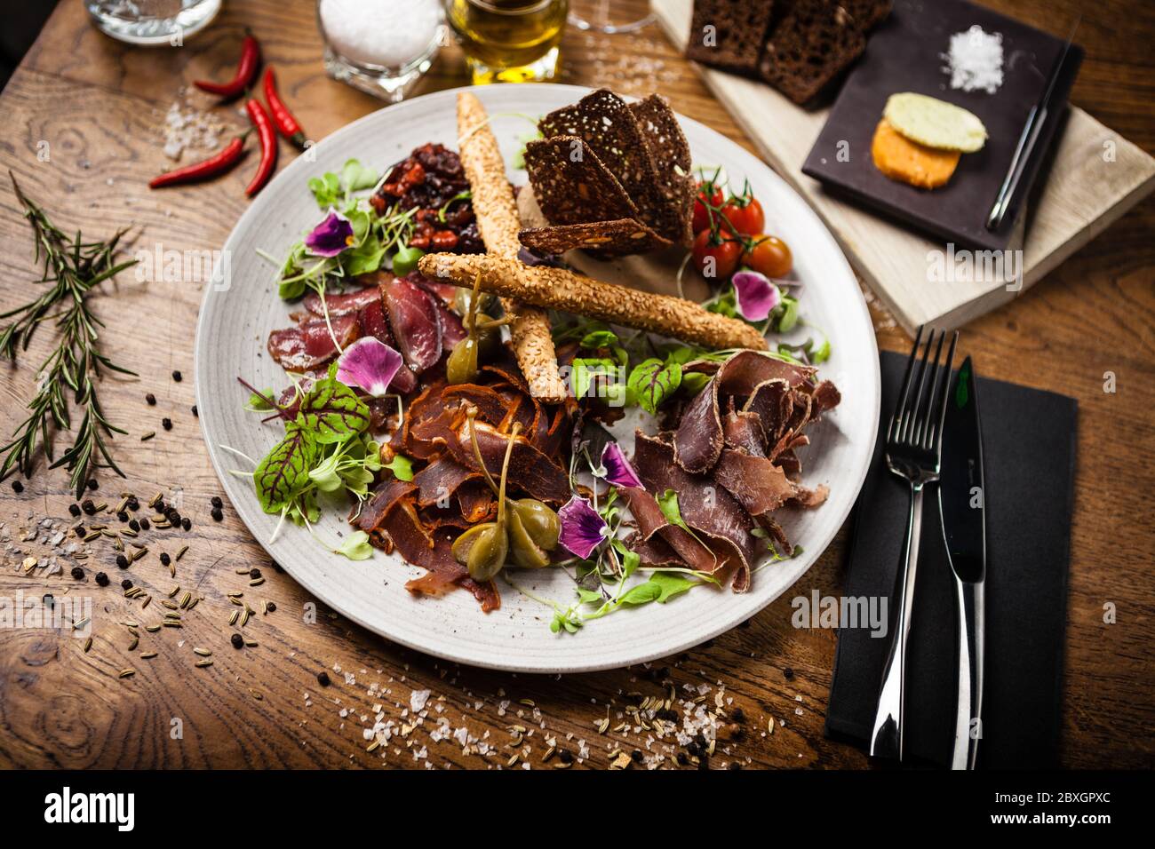 Meat platter for two: Dry-aged beef brisket, duck fillet, beef liver ...
