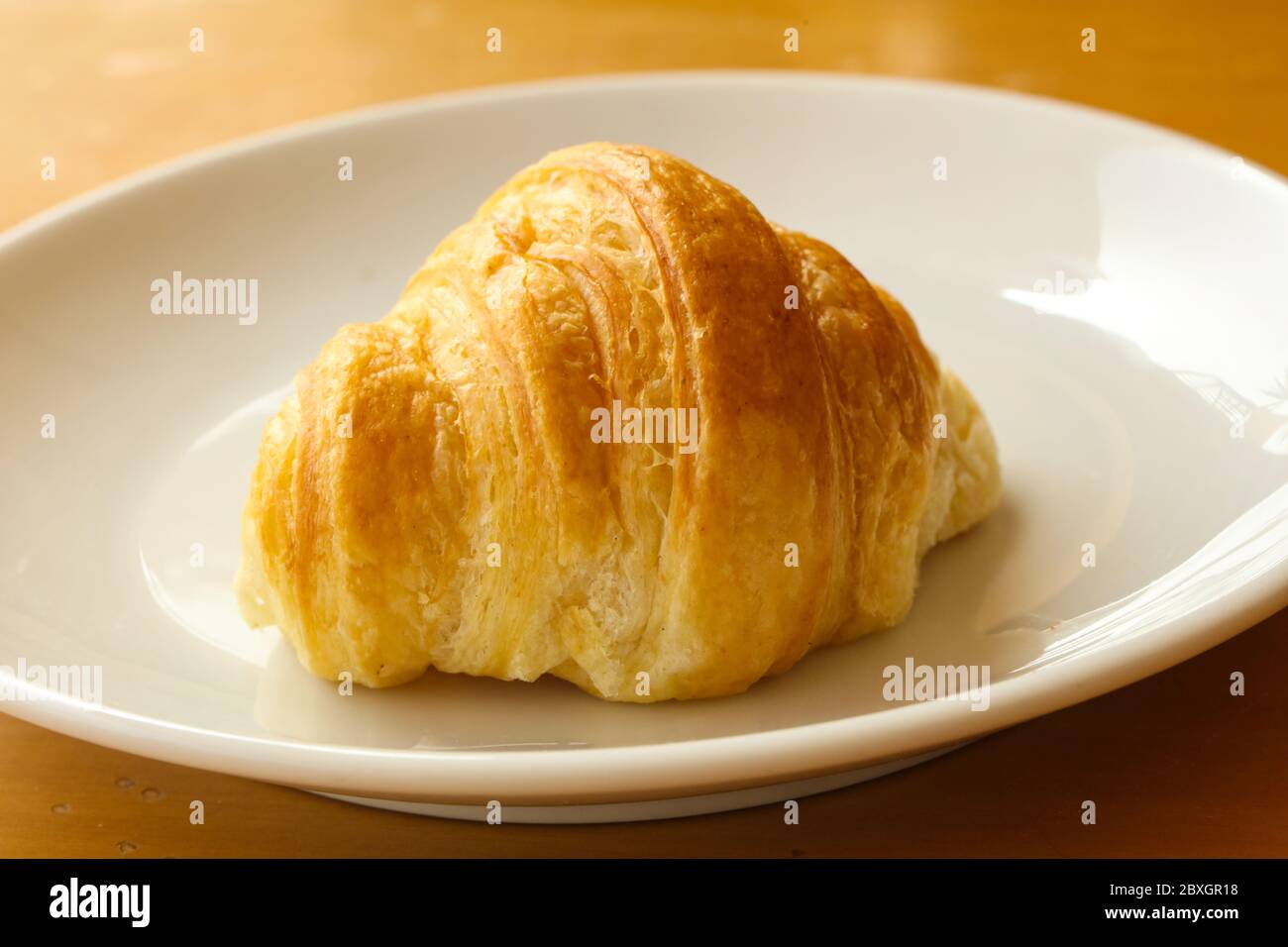 Tasty crust Croissant in the plate Stock Photo - Alamy