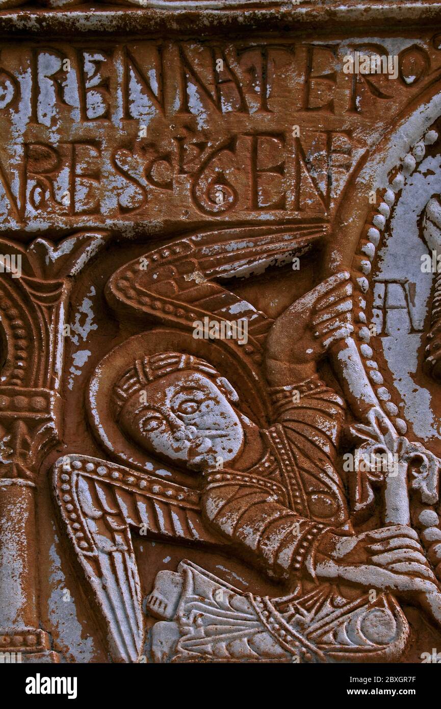 An archangel helps to support Christ in Majesty. Sculpted in the early ...