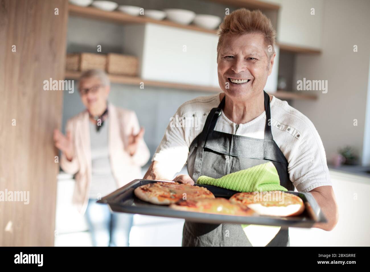 Elderly man preparing tea hi-res stock photography and images - Alamy
