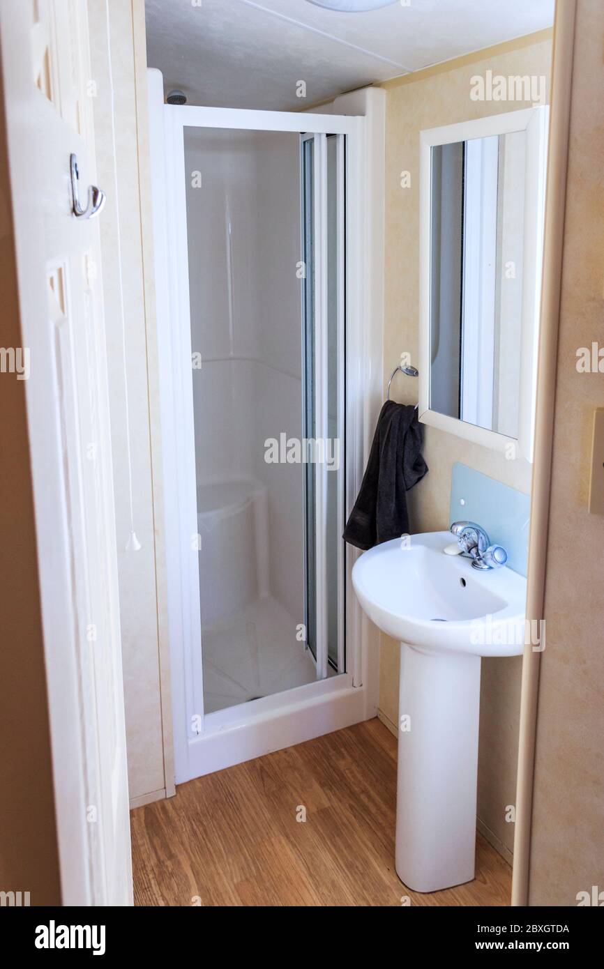Compact shower room in a British seaside caravan, UK Stock Photo - Alamy