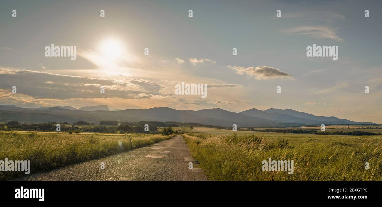 Panorama of the mountain Delijovan and the sun that is a little above ...