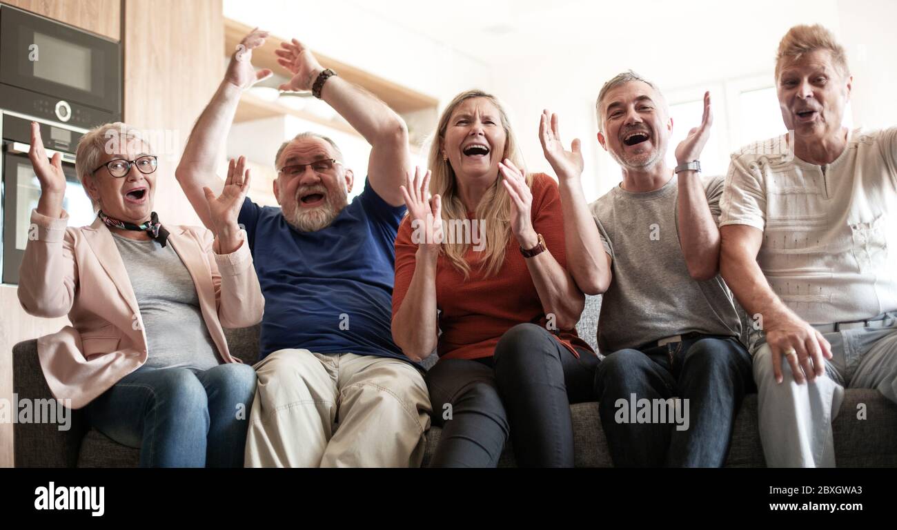 close up. Mature friends have fun together Stock Photo - Alamy