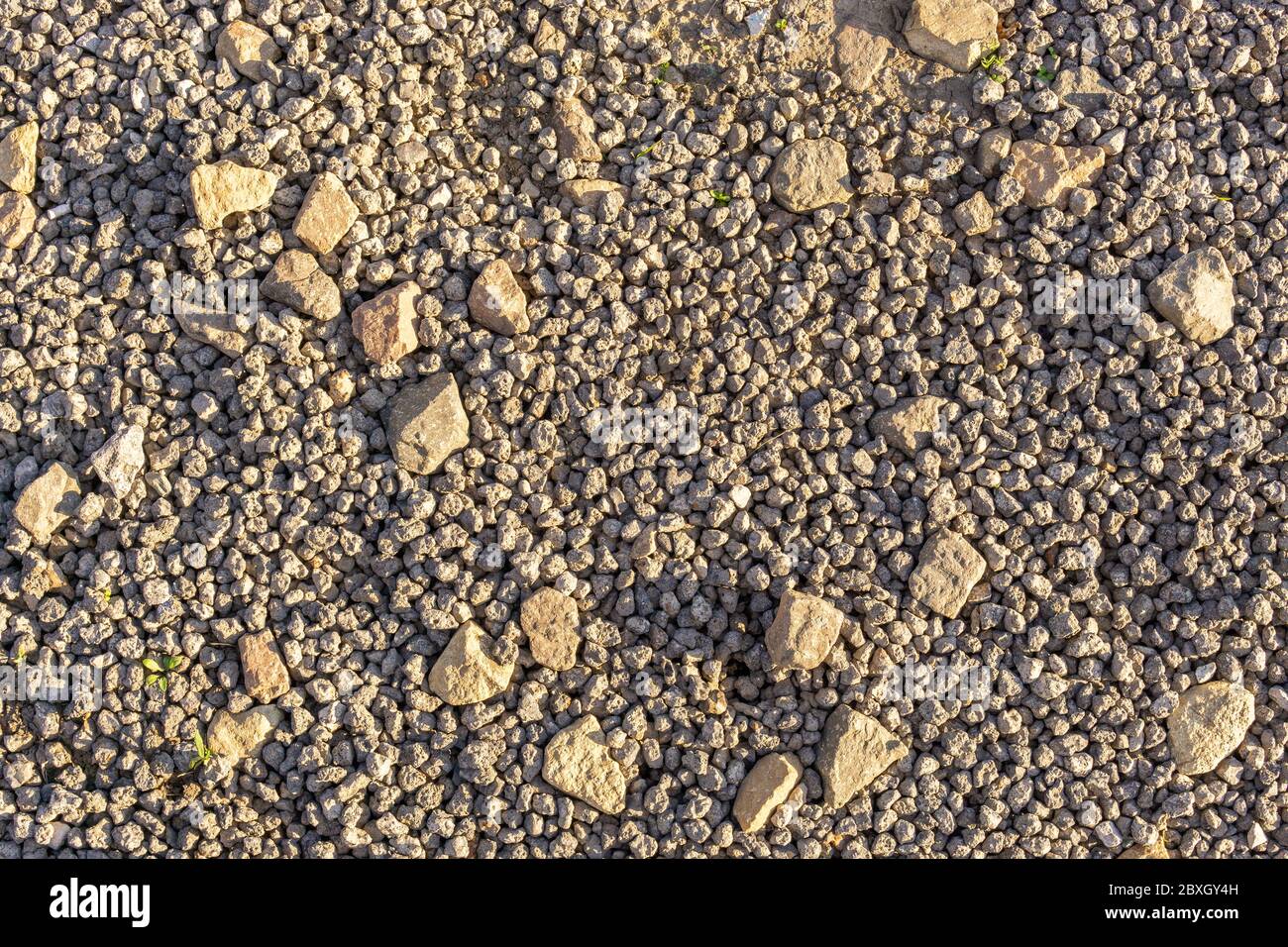 background stones, yellow cobbles texture of the road Stock Photo - Alamy